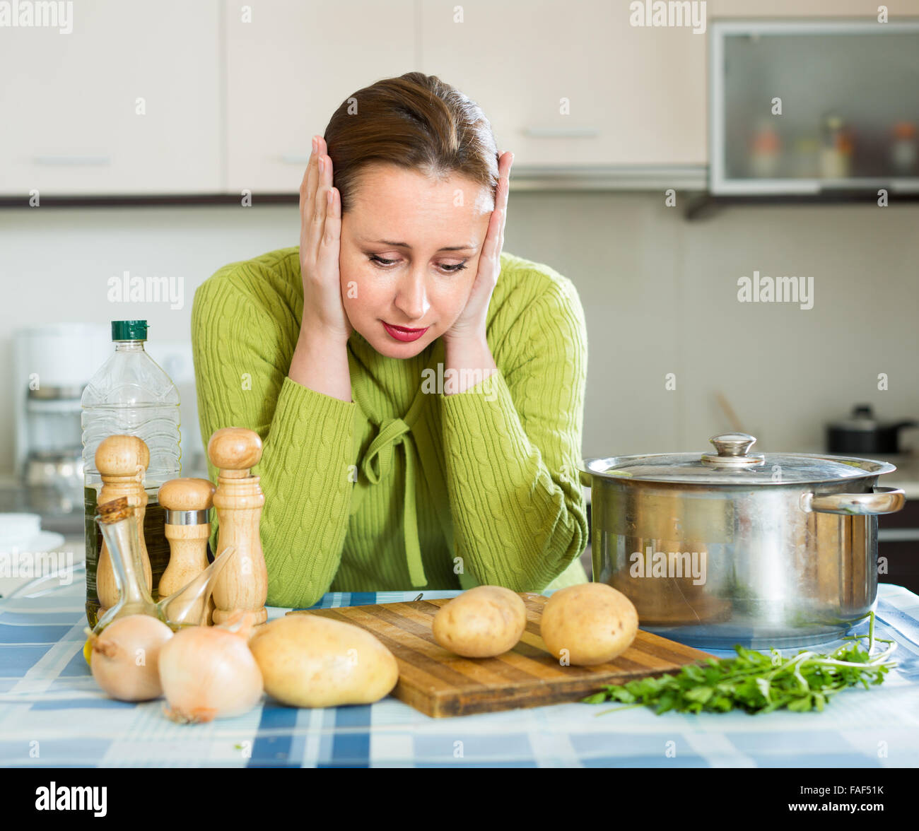 Tired modern housewife in hi-res stock photography and images - Alamy