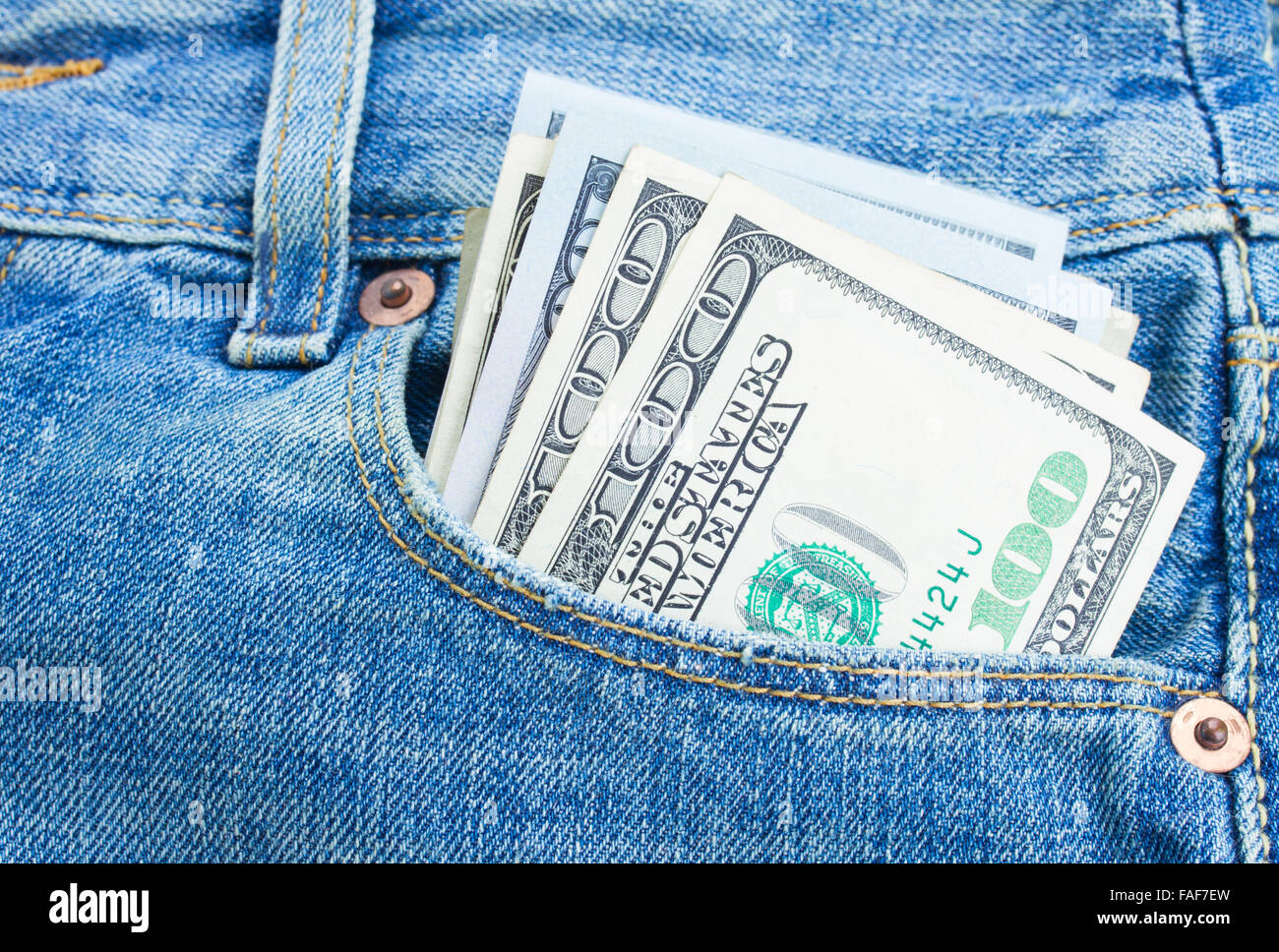 dollar money in pocket Stock Photo - Alamy