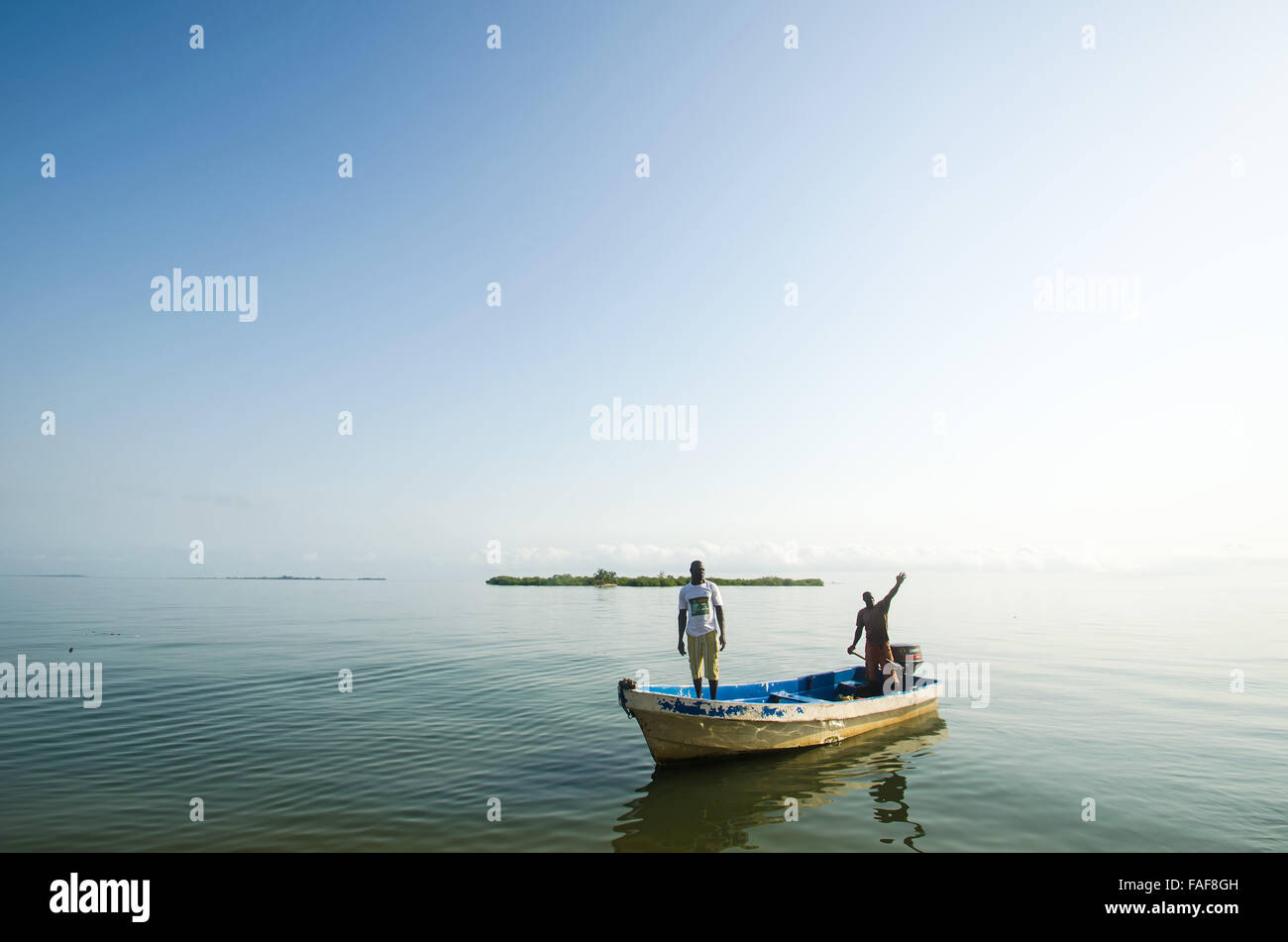 A boat approaches Yele, in the Turtle Islands, Sierra Leone Stock Photo ...