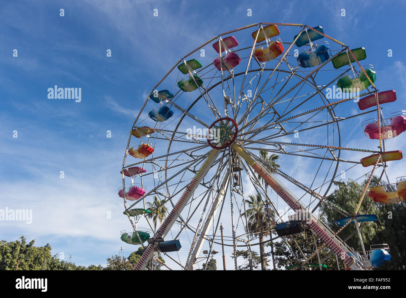 A colourful ferris wheel. Front view Stock Photo - Alamy