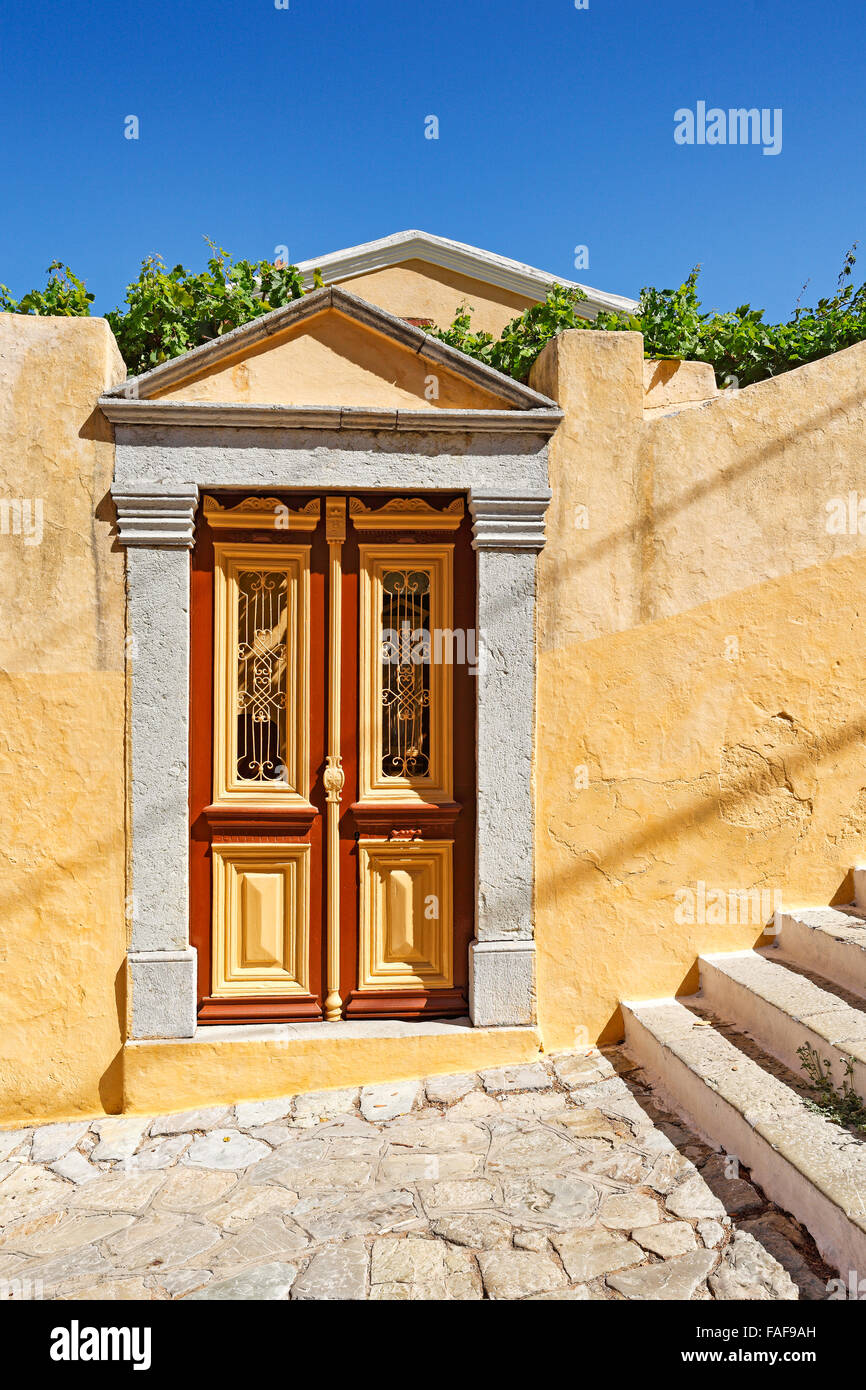 Old door of a mansion at the upper town (Chorio) of Symi island, Greece ...