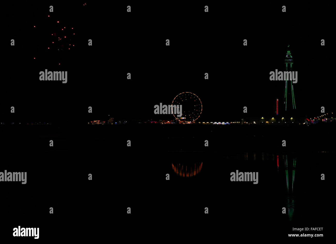 Blackpool tower red green colours illuminated standing rising centre ...