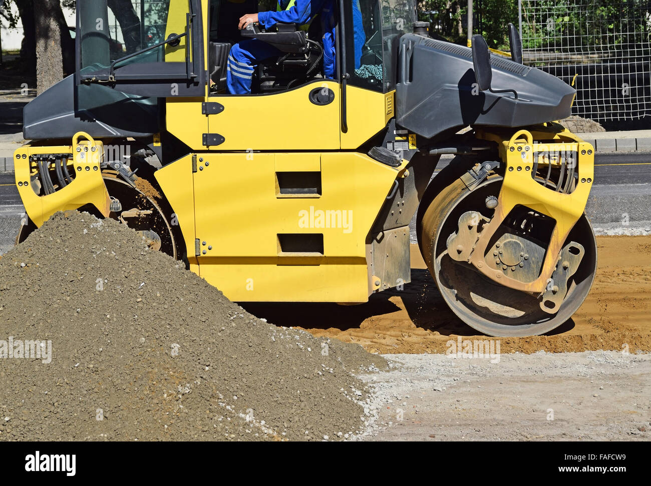 Road roller at work at the road construction Stock Photo - Alamy