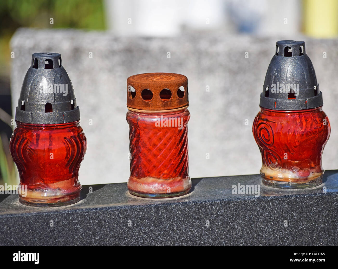 Lanterns on the tombstone in the public cemetery Stock Photo - Alamy