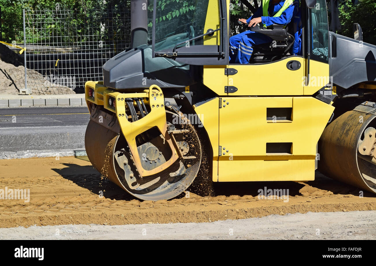 Road roller at the road construction in the city Stock Photo - Alamy