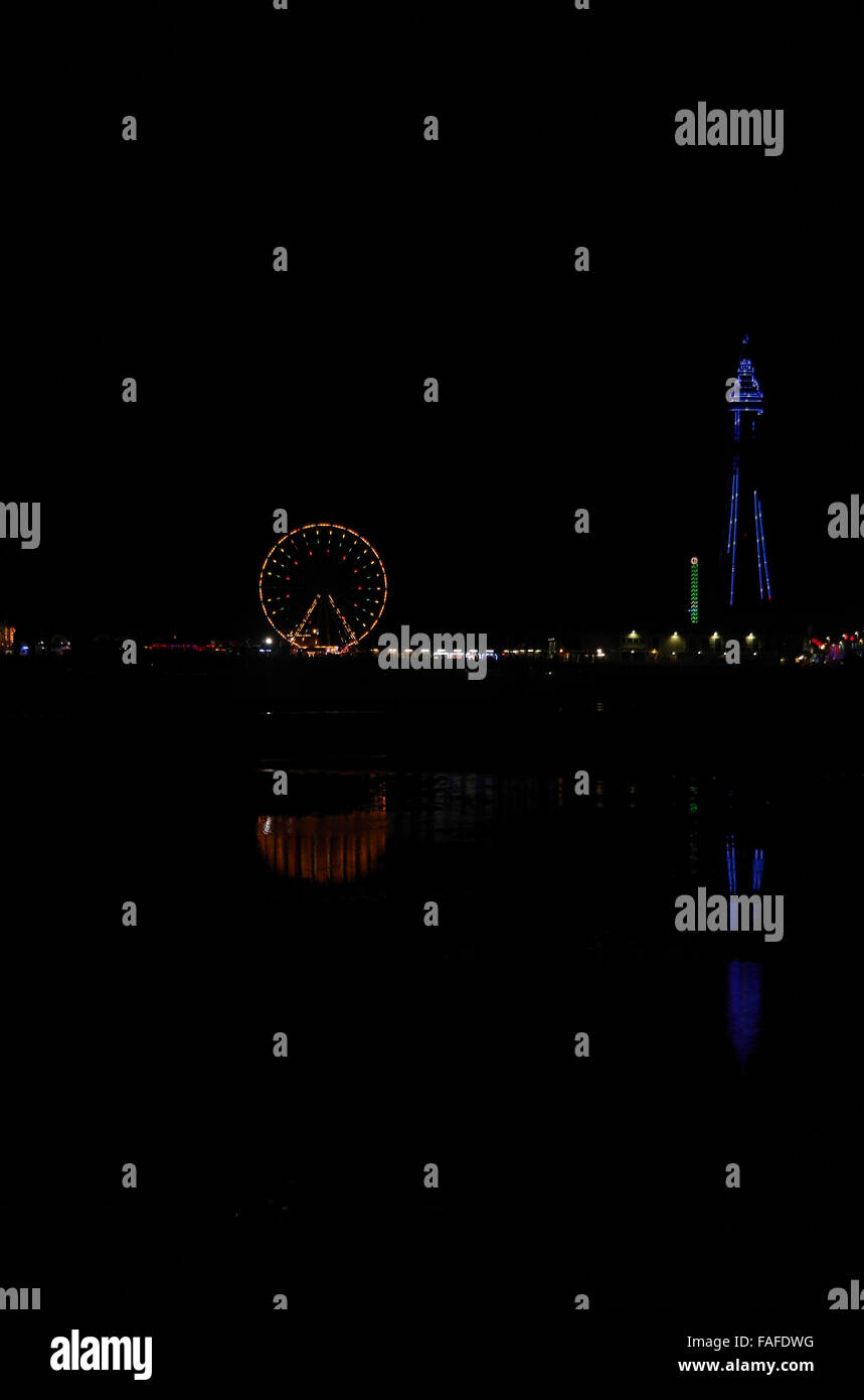 Blackpool tower blue green colours illuminated standing rising centre ...