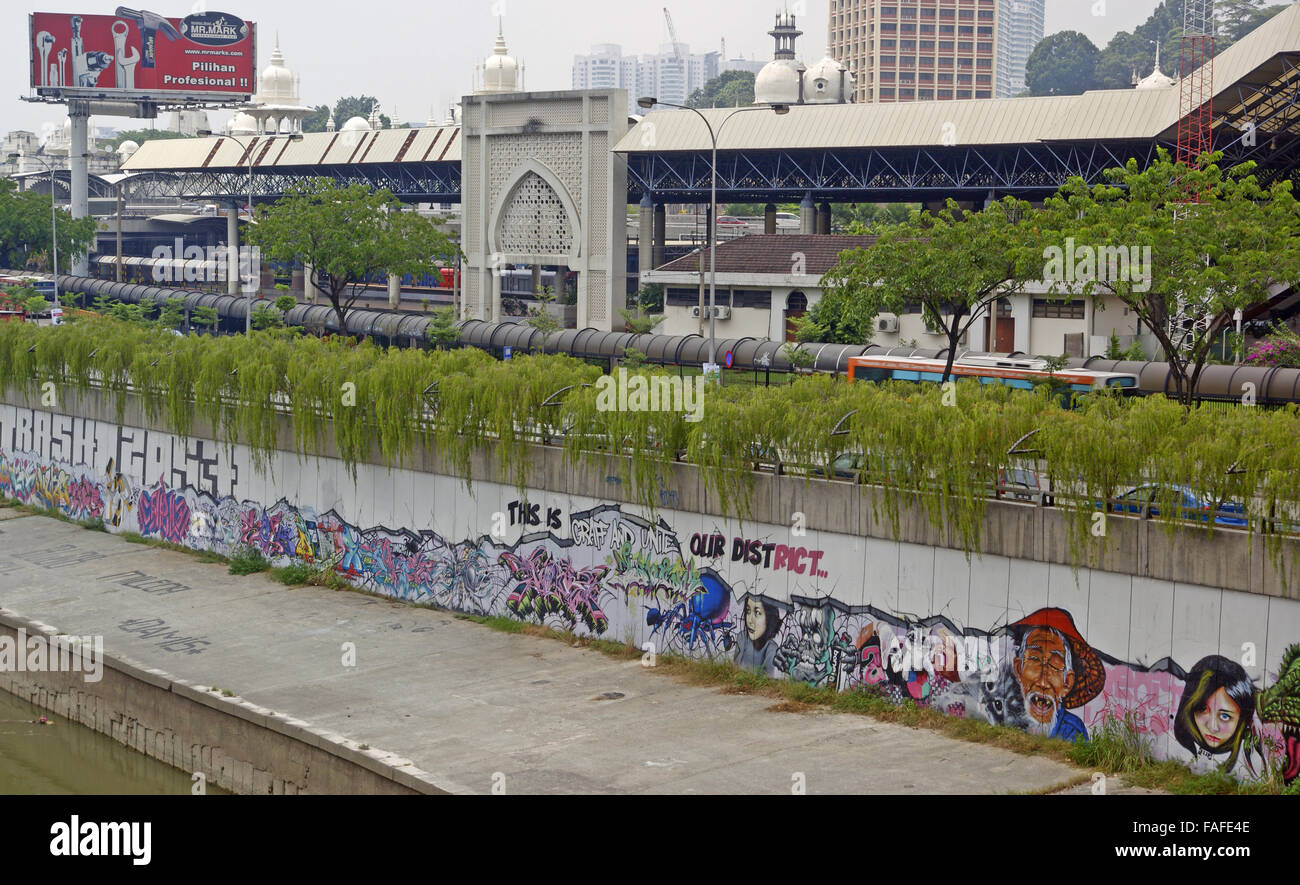Graffiti on riverbank wall in front of mosque in kuala lumpur, Malaysia ...