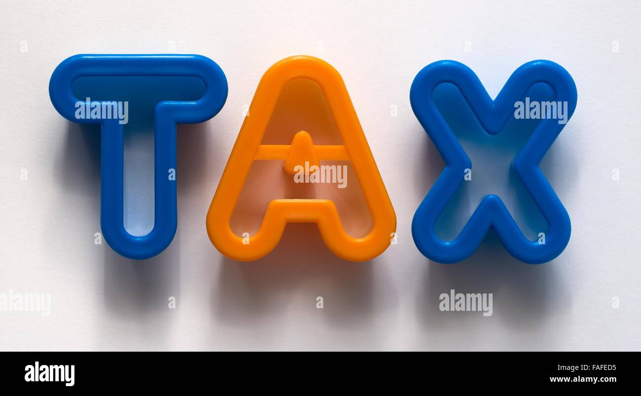 Colorful letters spelling the word TAX Stock Photo - Alamy