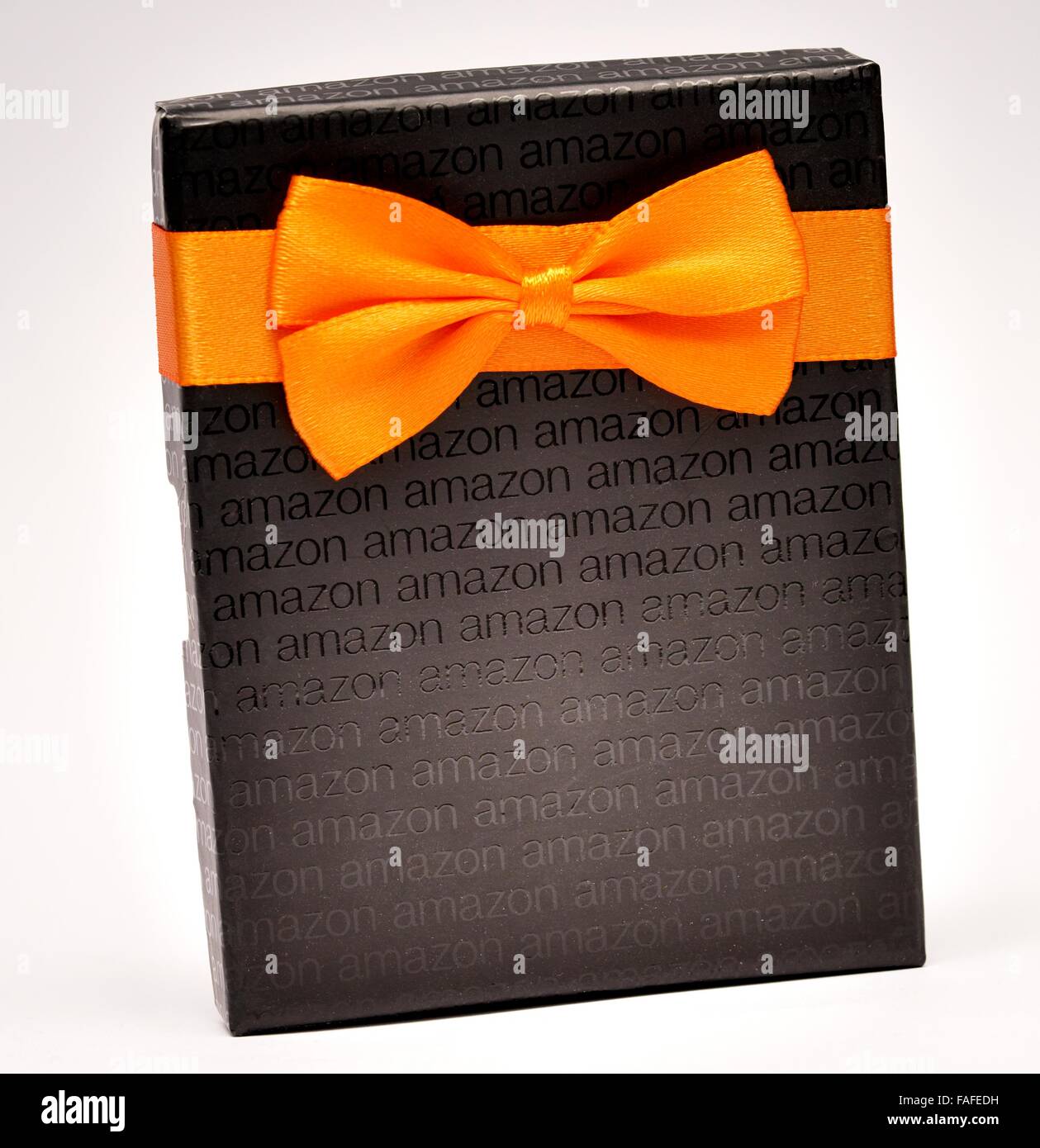 Amazon gift card wrapped with an orange ribbon Stock Photo - Alamy