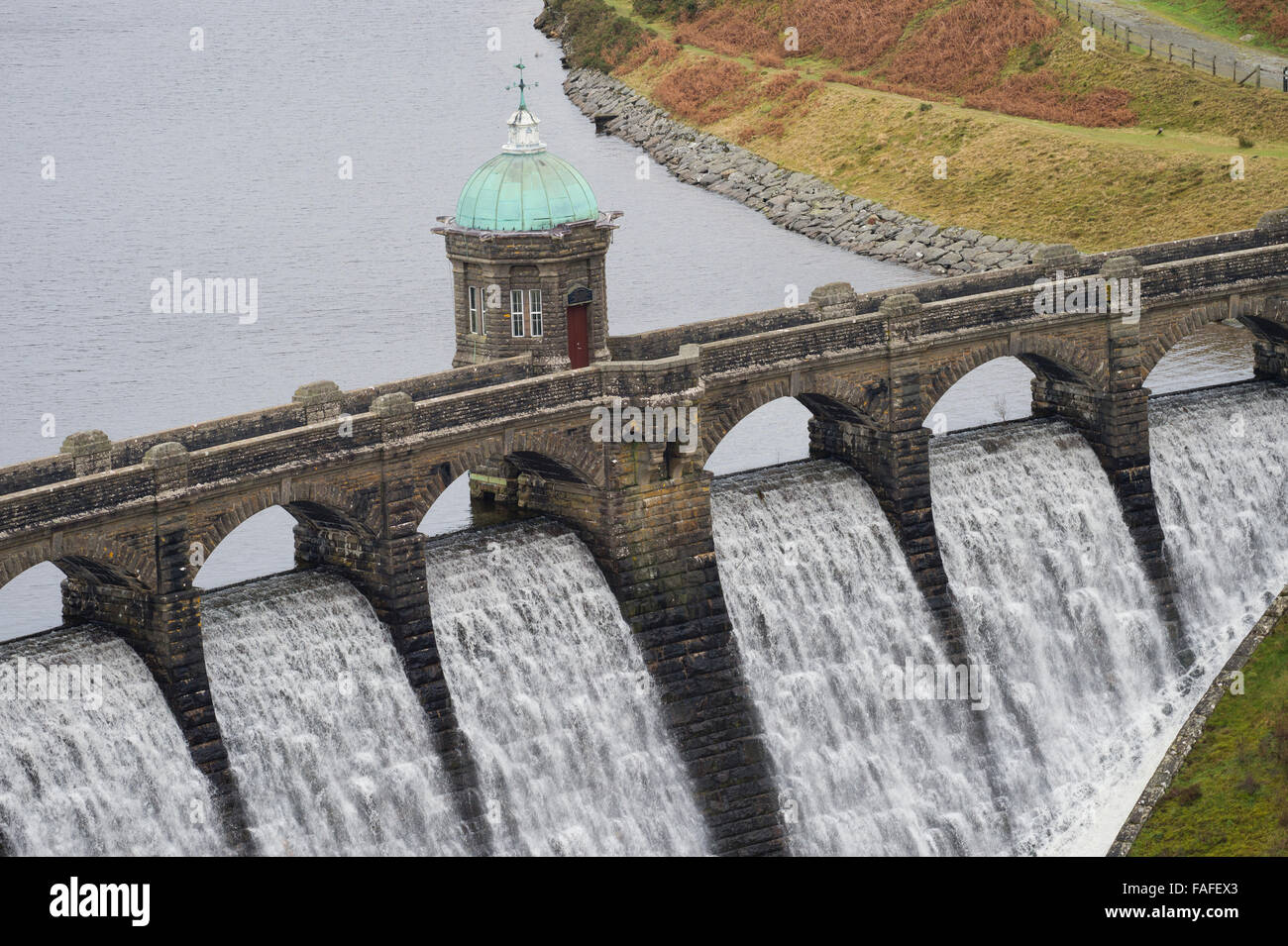 Water overflowing spilling over Craig Goch dam and reservoir, Elan ...