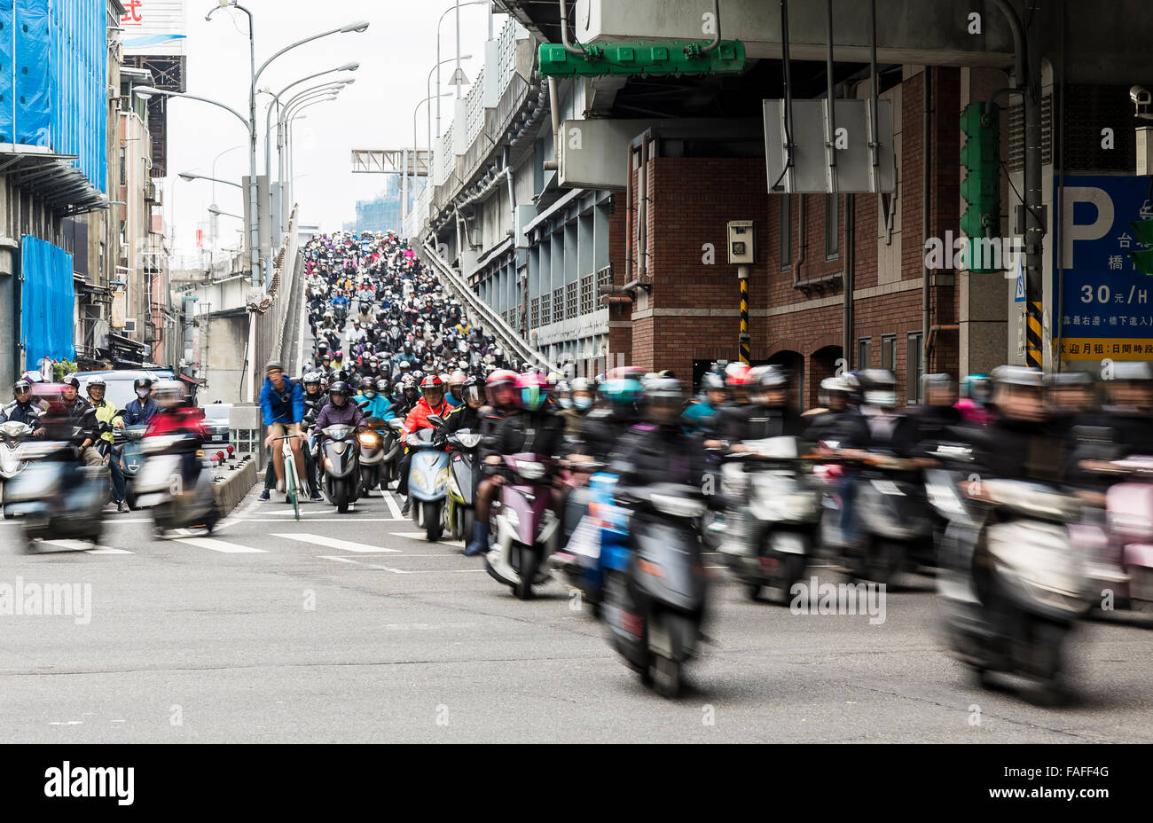 Taipei, Taiwan - December 2015 - Heavy rush hour scooter traffic on a ...