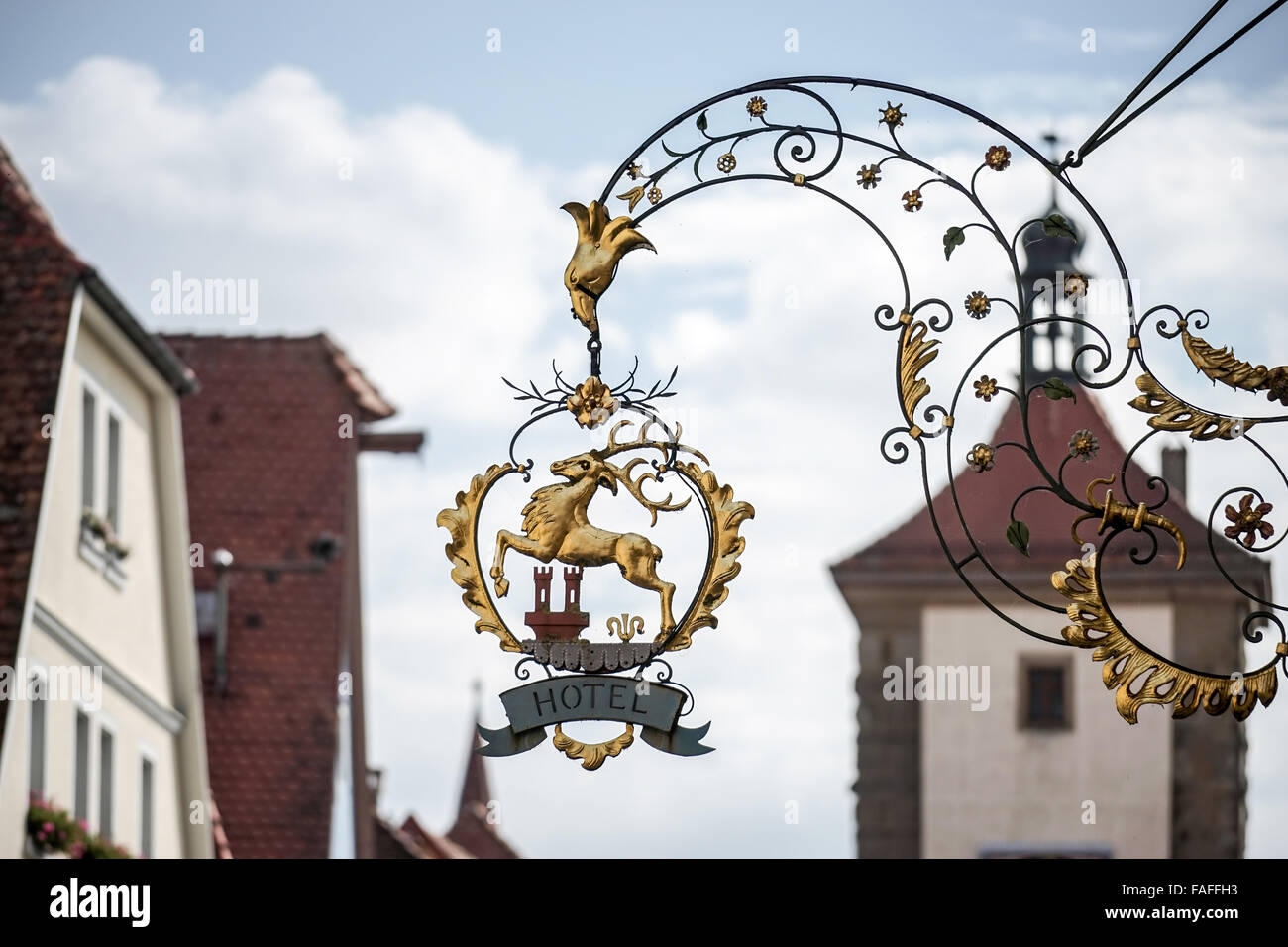 Hotel hanging sign in Rothenburg Stock Photo - Alamy