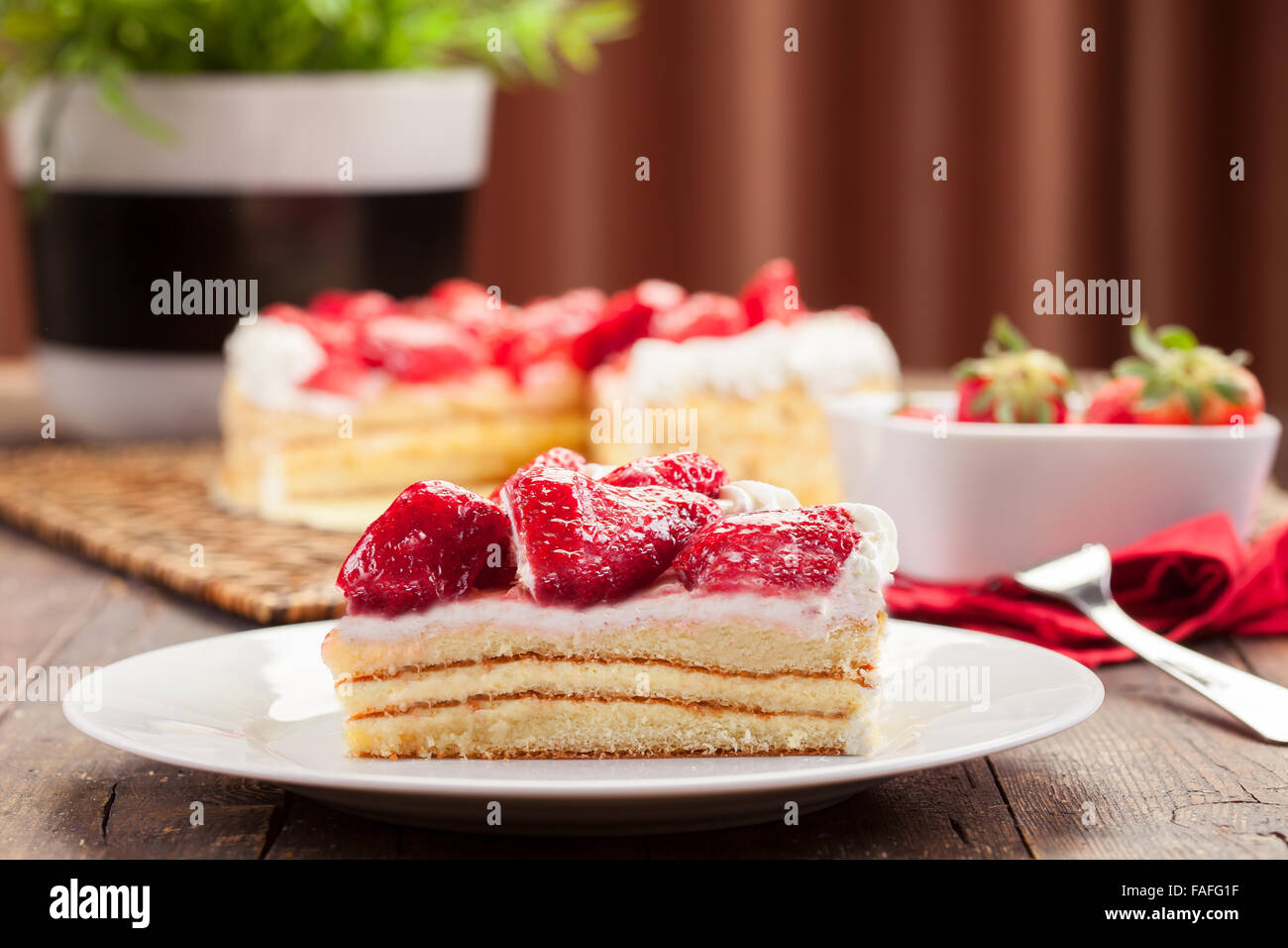 Sponge cake with strawberry , Desert After Main Dinner Stock Photo - Alamy