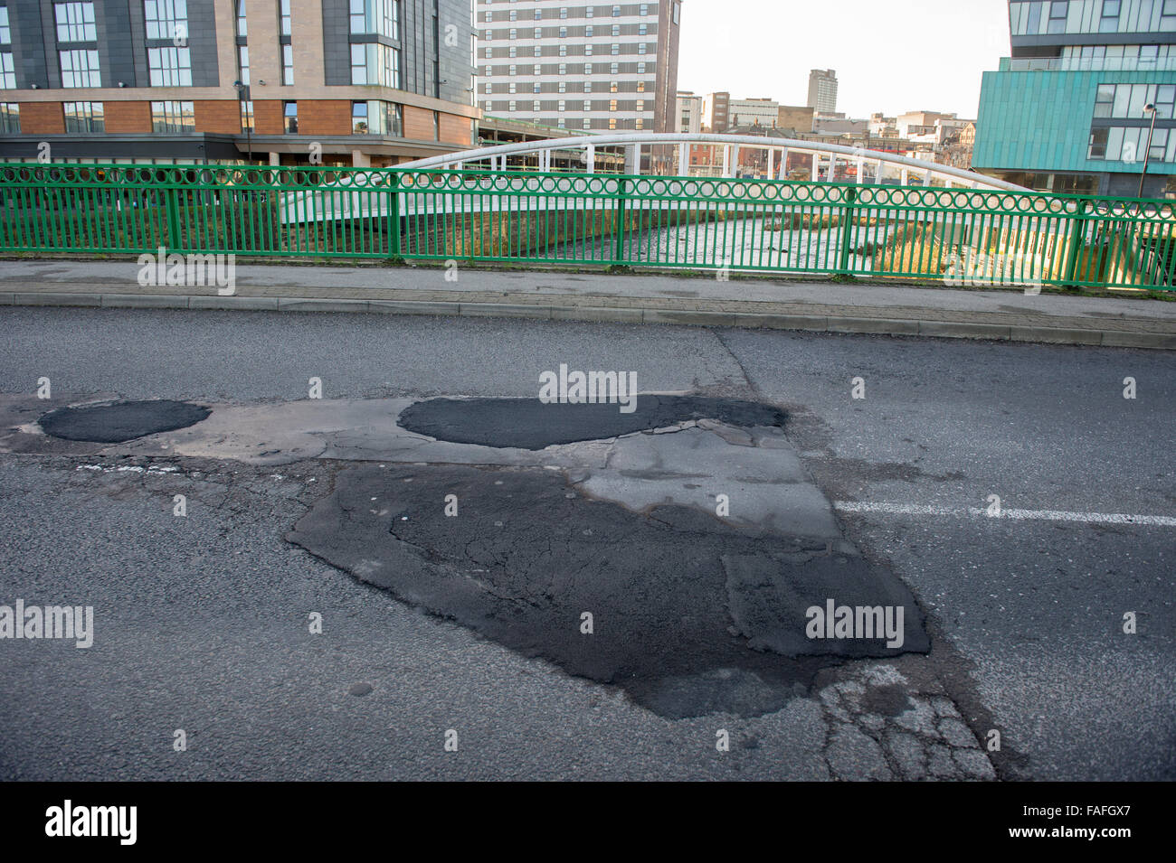 An example of a potholed and repaired road in the city of Sheffield in ...