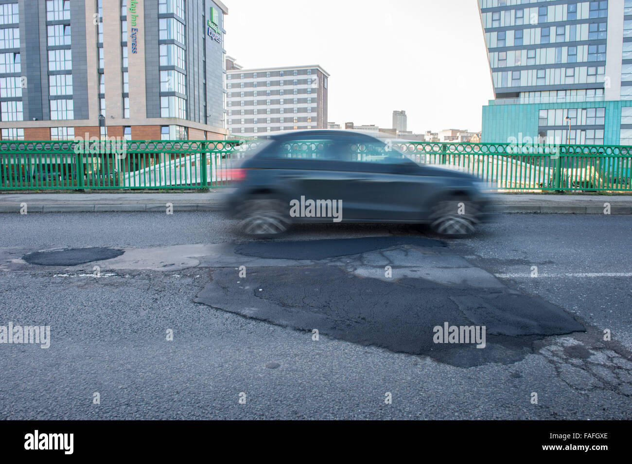 An example of a potholed and repaired road in the city of Sheffield in ...