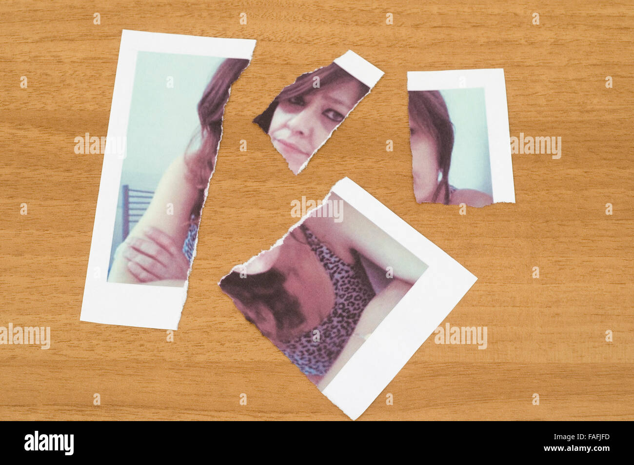 Torn photograph hi-res stock photography and images - Alamy