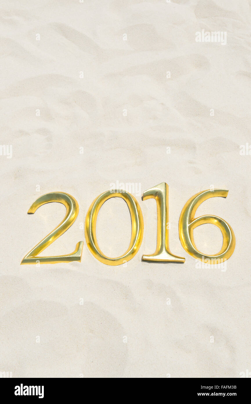 Golden 2016 message resting in smooth sand on Ipanema Beach in Rio de ...