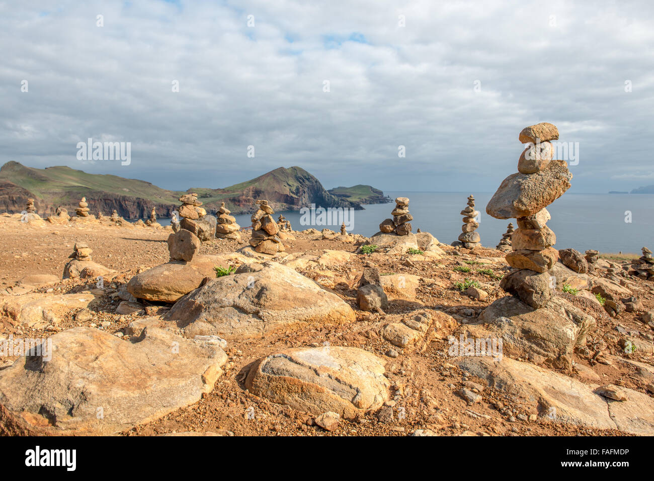 Sandy stone sculptures made by tourists in Madeira Stock Photo - Alamy