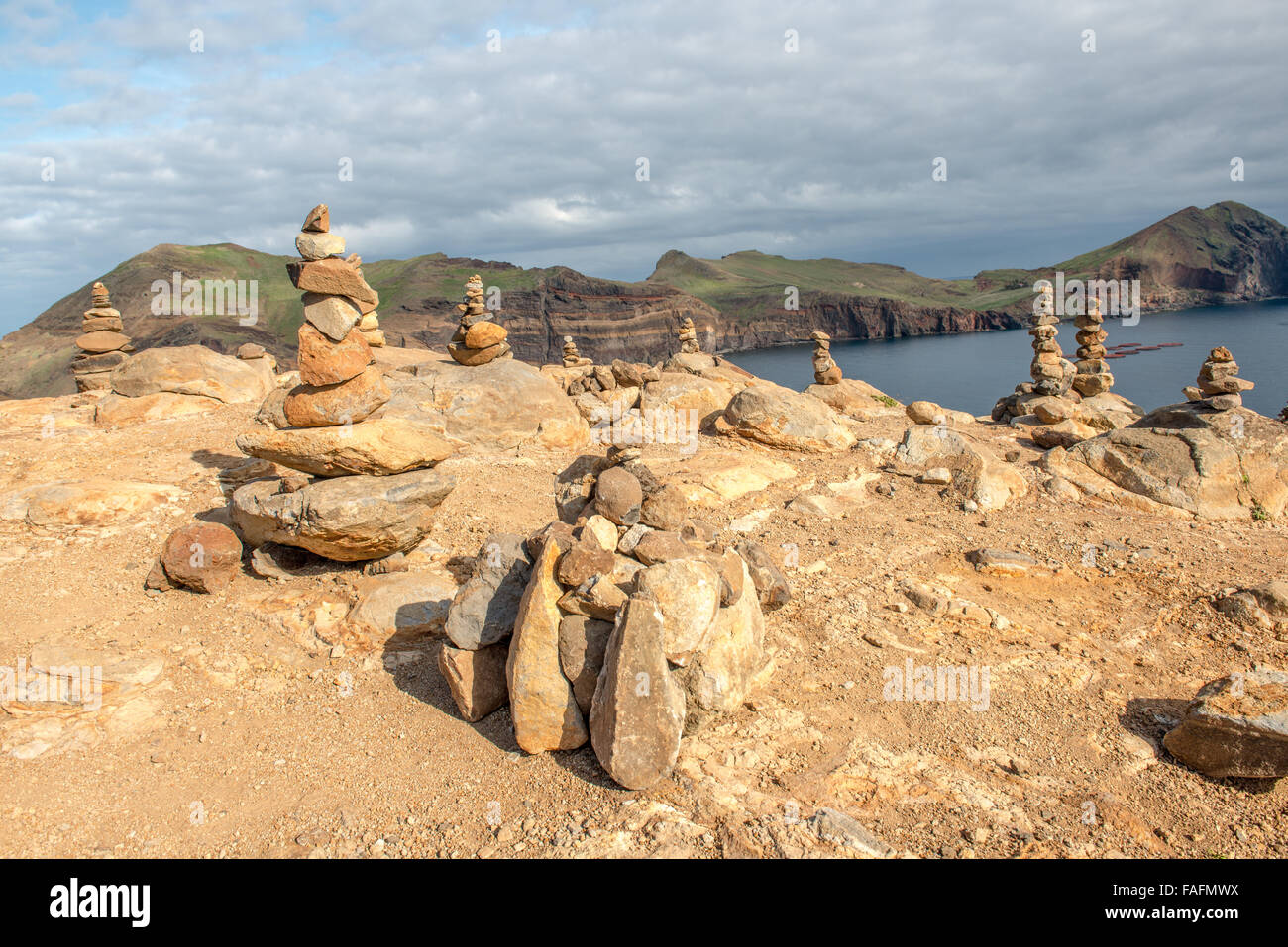 Sandy stone sculptures made by tourists in Madeira Stock Photo - Alamy