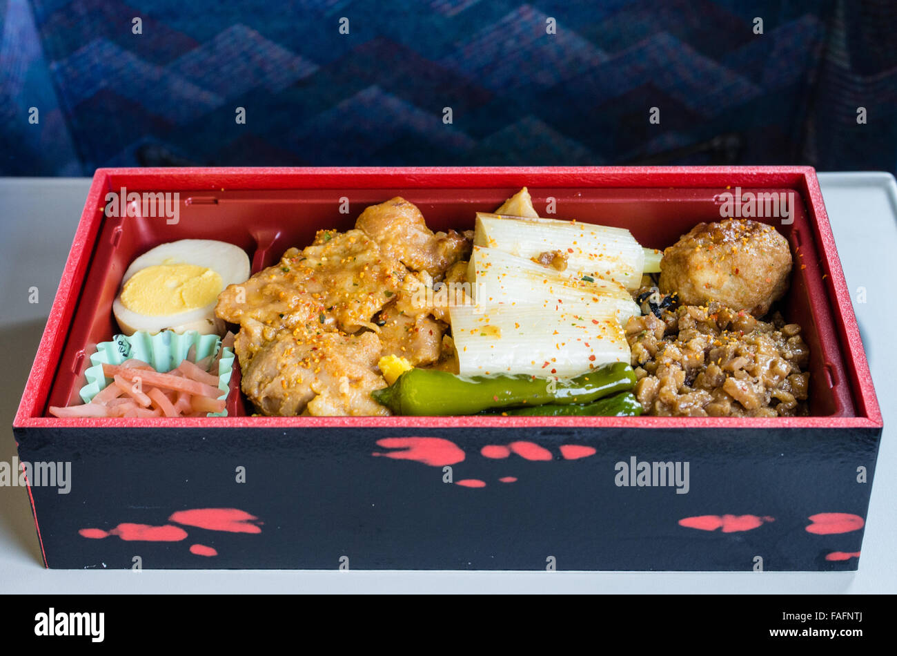 A typical "eki-ben", a type of Japanese lunch box that is sold in train ...