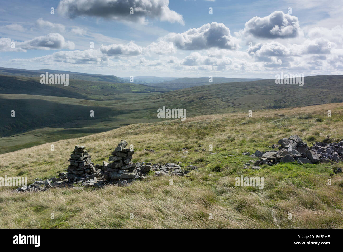 Stone Cairns on Baugh Fell, looking down Grisedale towards Wensleydale ...