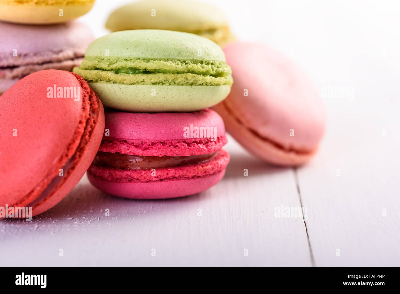 French Macaroons On White Boards Background Stock Photo - Alamy