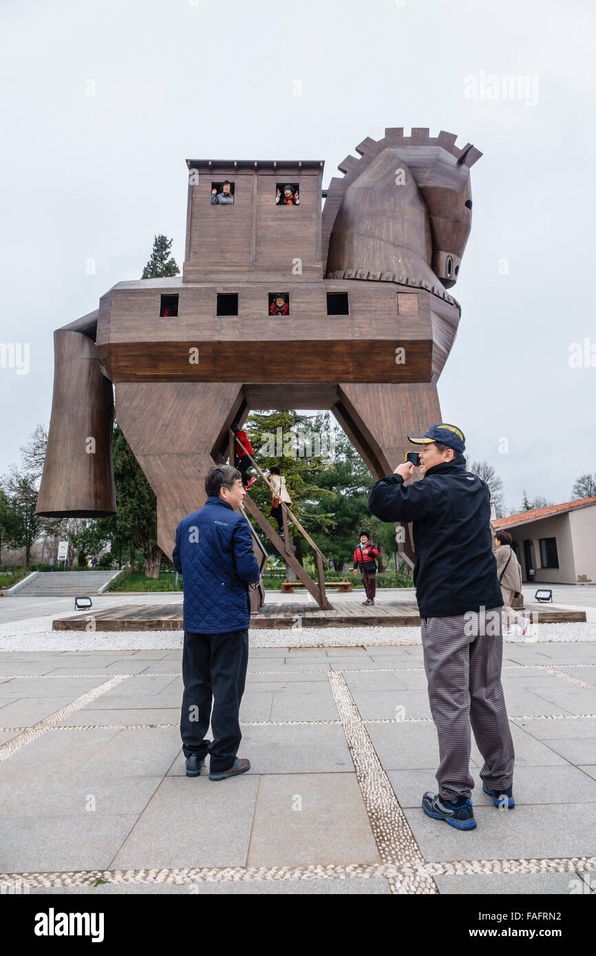 Turkey travel - the ruins of Troy. Tourists visit the replica (imagined ...