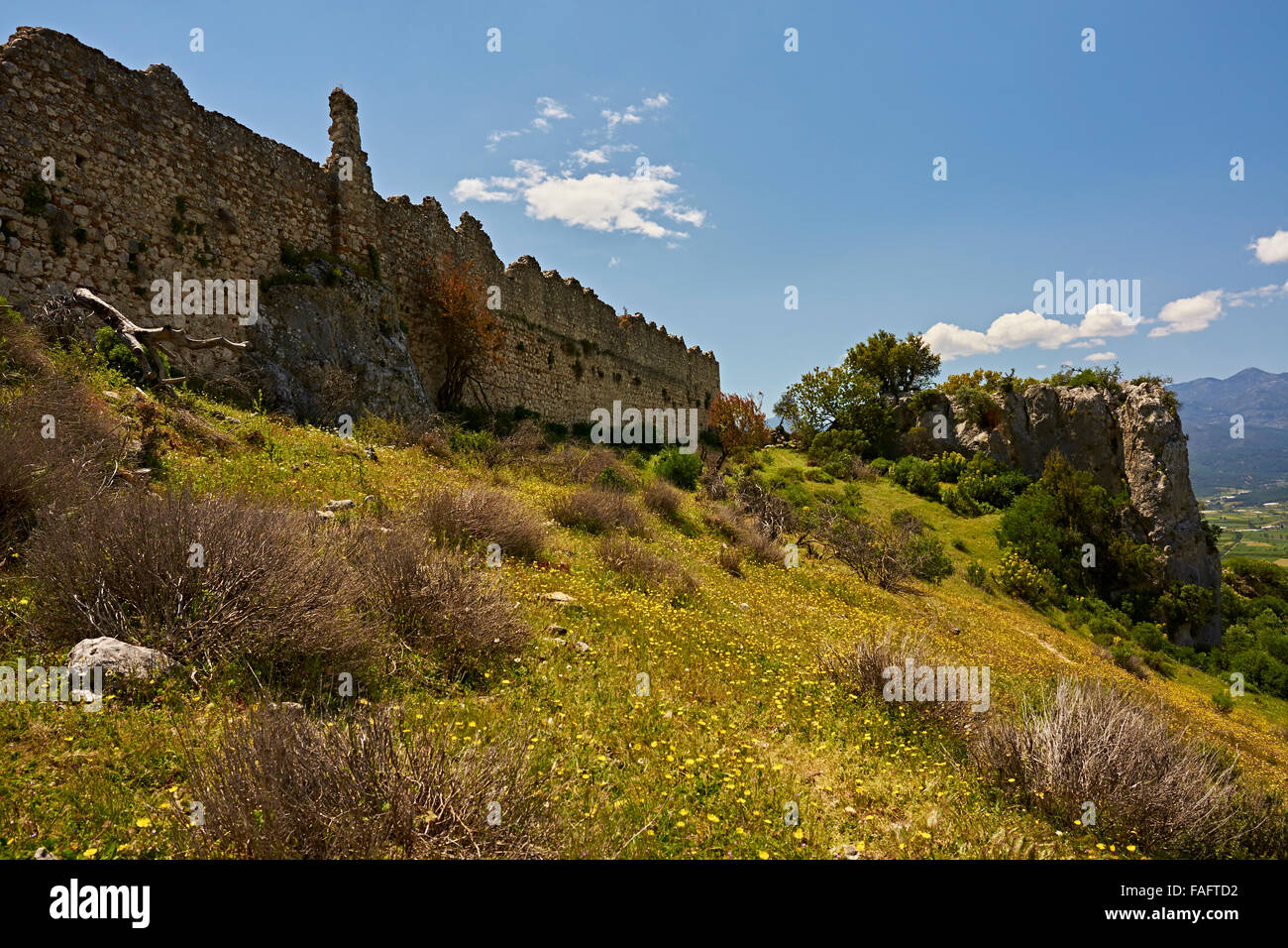 Low viewpoint of northern wall of acropolis on hill top. Tlos Turkey ...