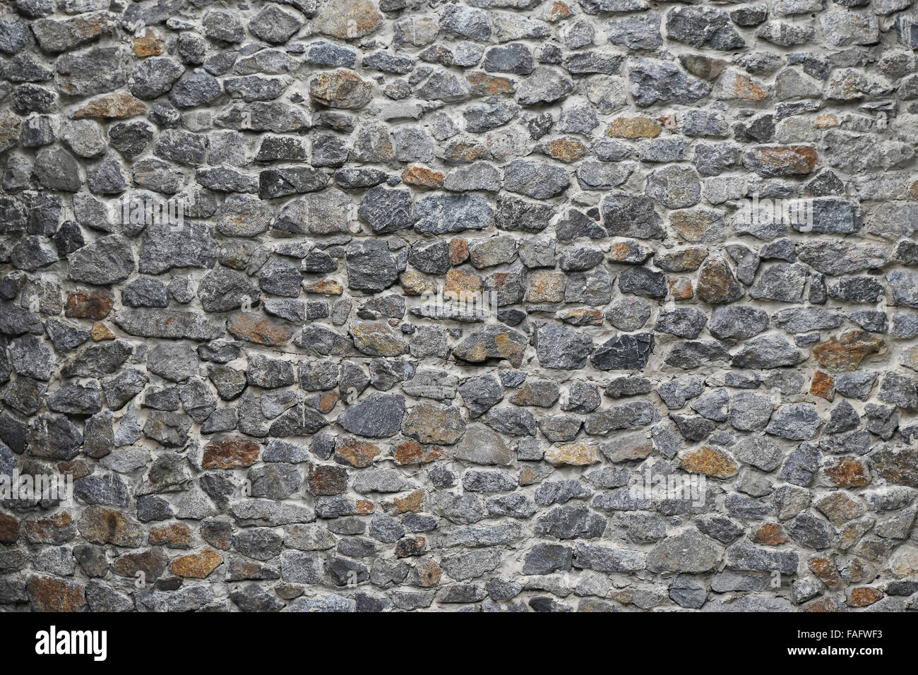 Old style rough stone rock wall texture Stock Photo - Alamy
