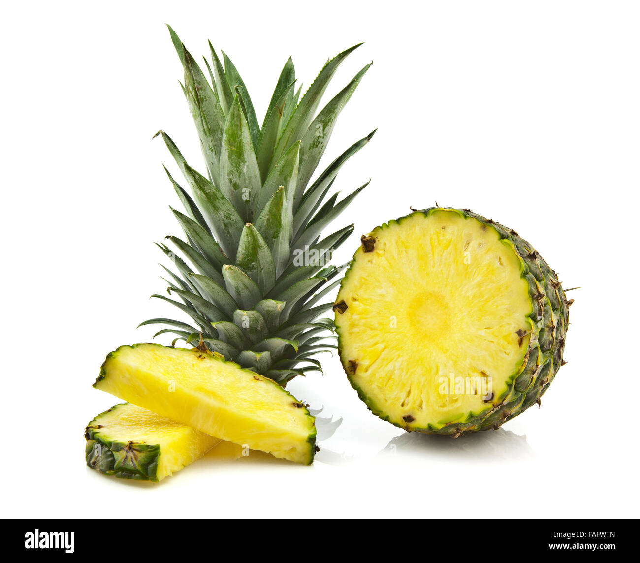Pineapple Slices on white background Stock Photo - Alamy