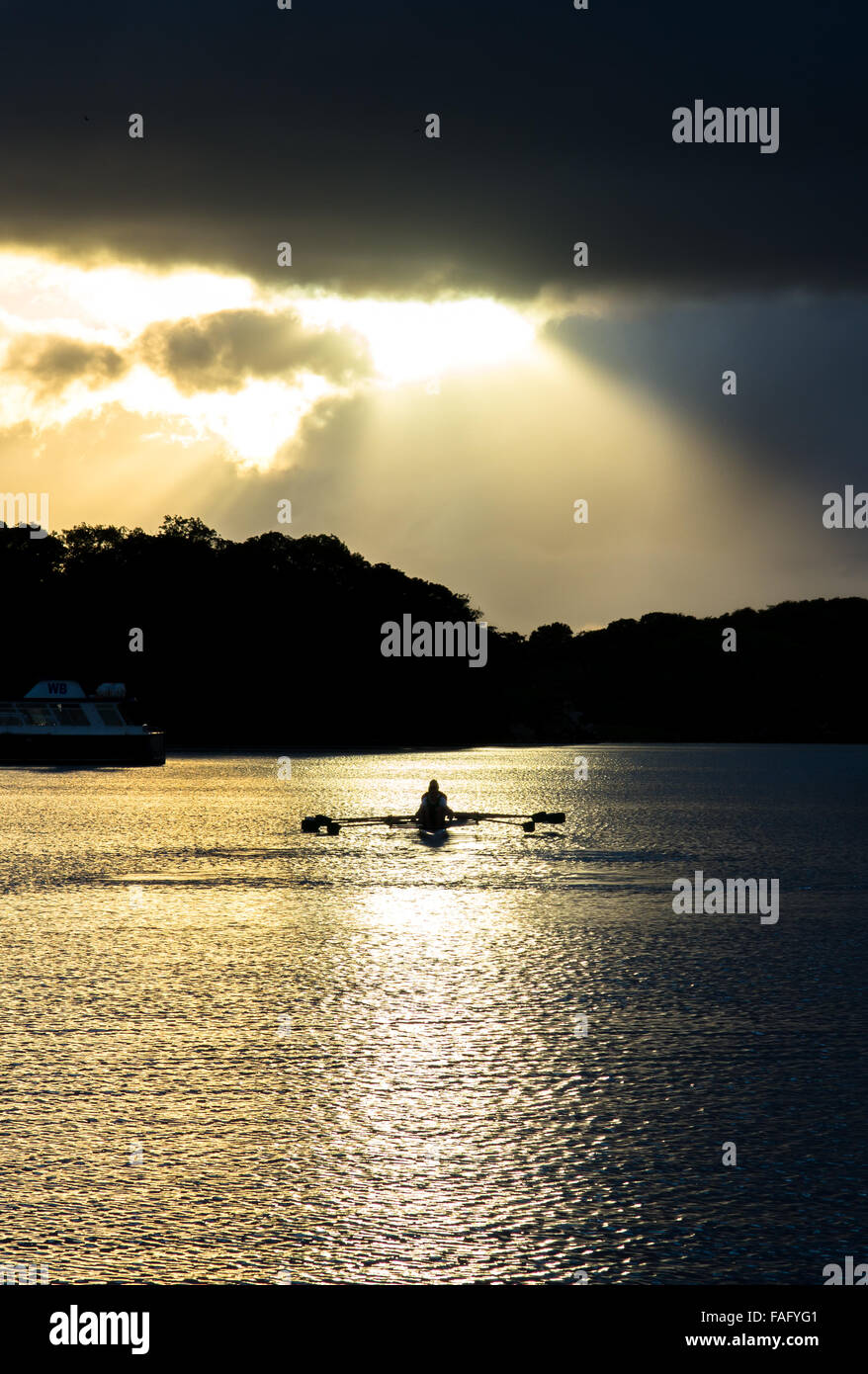 Quadruple Sculls Rowing Boat on Sunset Lake Stock Photo - Alamy