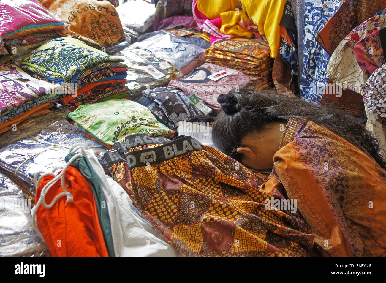 Sleeping sales assistant Stock Photo - Alamy