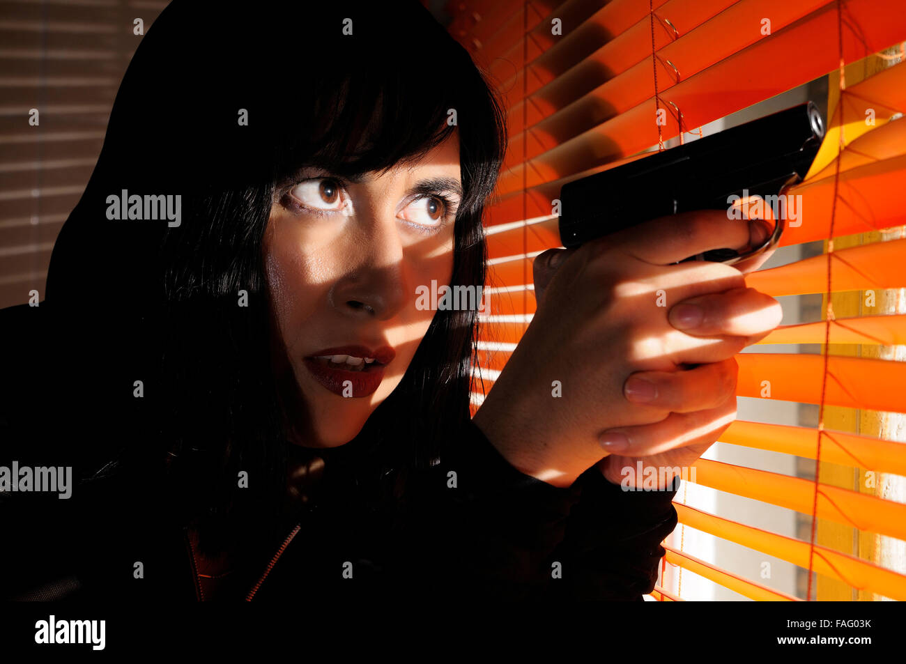 Pointing gun at shadow hi-res stock photography and images - Alamy