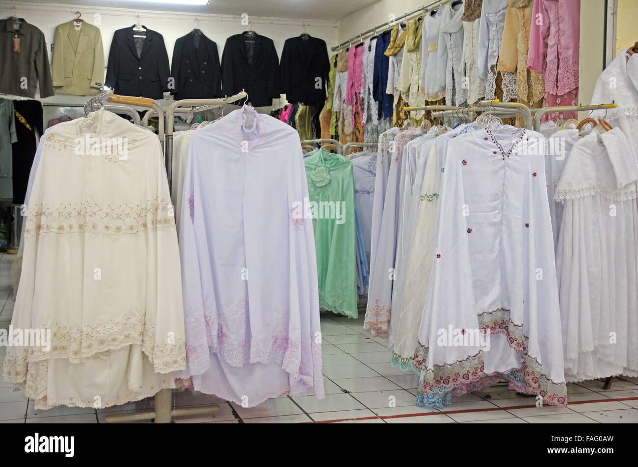 Mukena Islamic prayer robe shop Stock Photo - Alamy