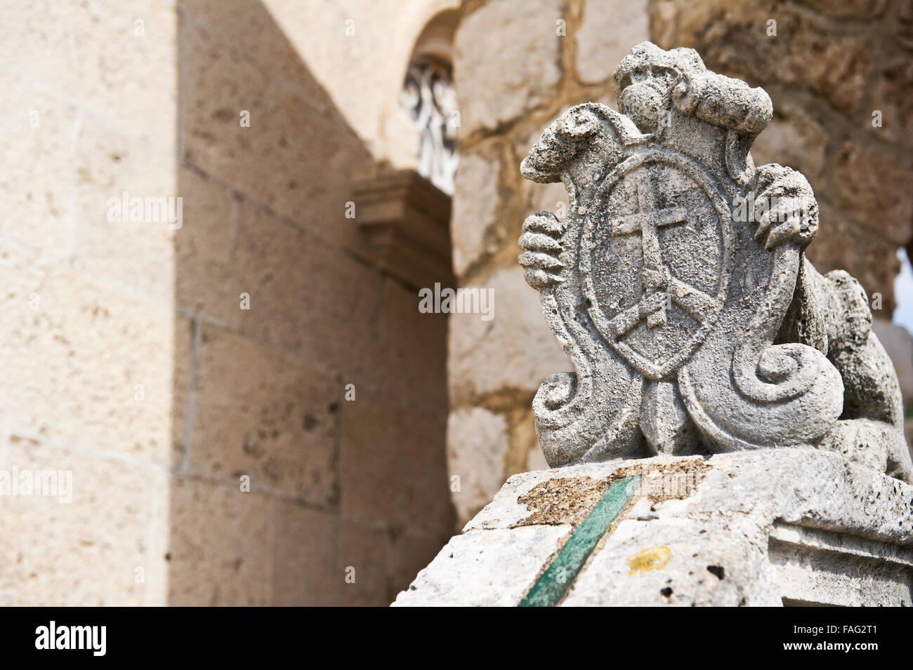 A decorative stone shield with a cross on the Island of Our Lady on the ...
