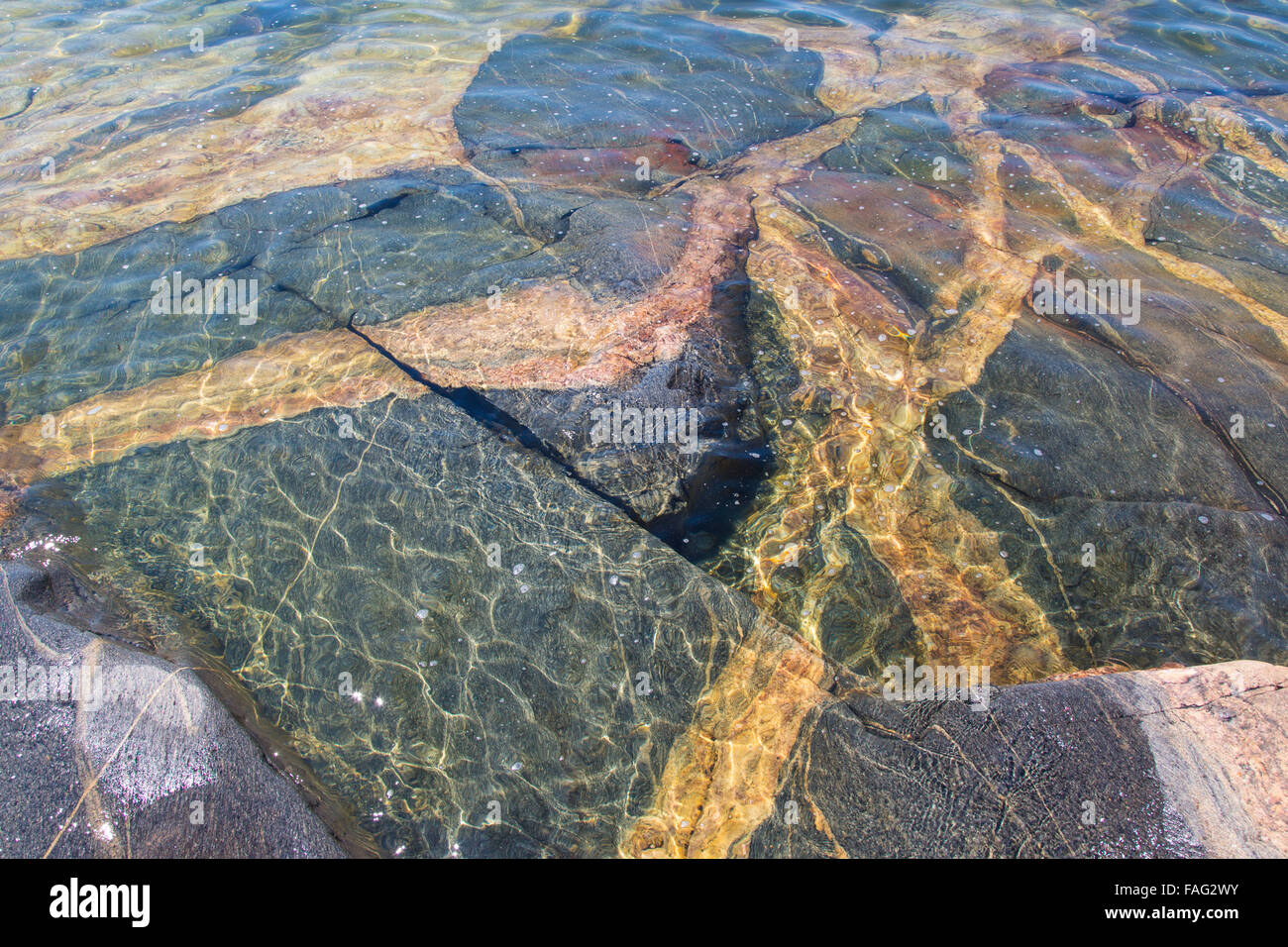 Rocks along shore in Lake Superiori in Ontario Canada Stock Photo - Alamy