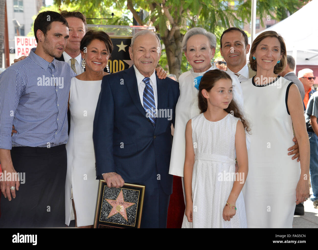 LOS ANGELES, CA - AUGUST 27, 2015: Music executive Joe Smith & family ...