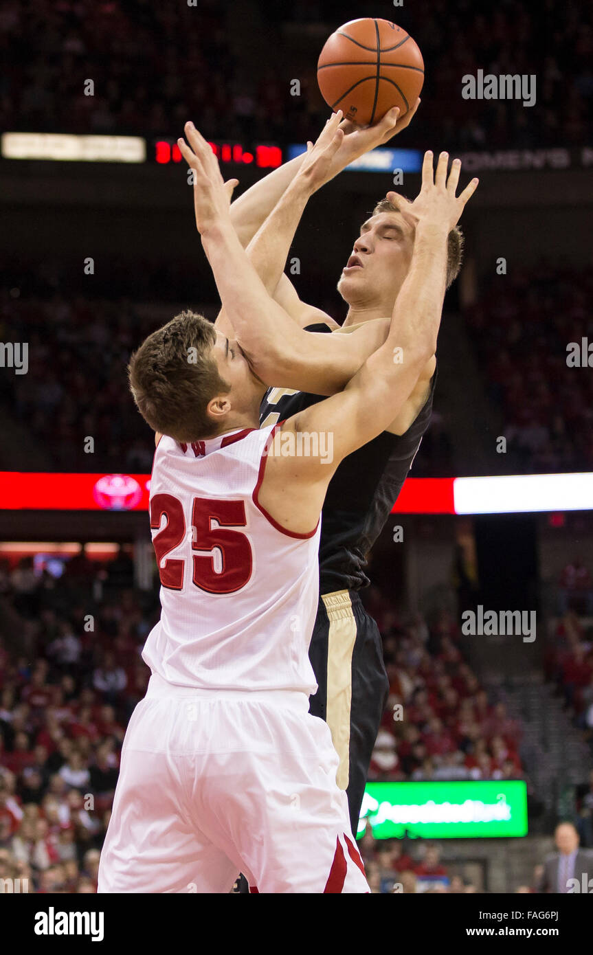 Madison, WI, USA. 29th Dec, 2015. Purdue Boilermakers center Isaac Haas #44 shoots over ...