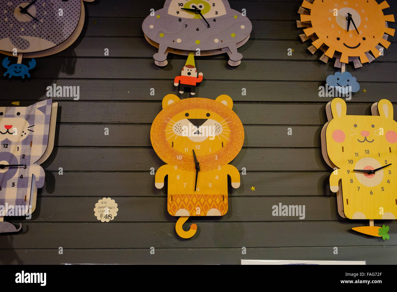 Animal designs for clocks for children in a kids store Stock Photo - Alamy