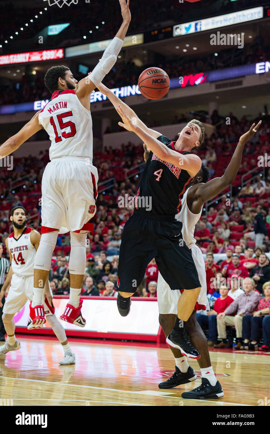 Raleigh, NC, USA. 29th Dec, 2015. Northeastern guard David Walker (4 ...