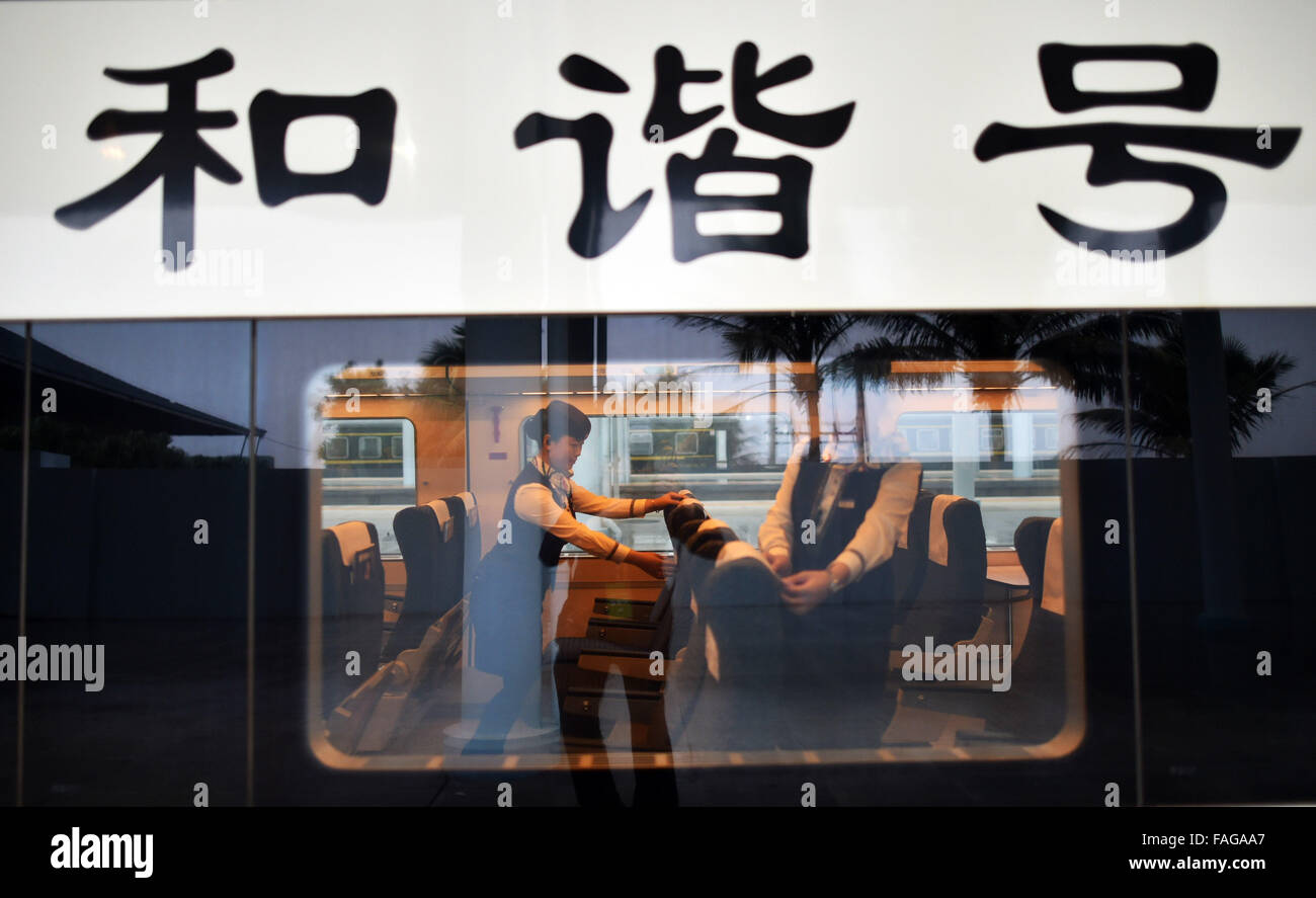 Haikou, China's Hainan Province. 30th Dec, 2015. Steward arrange seats ...