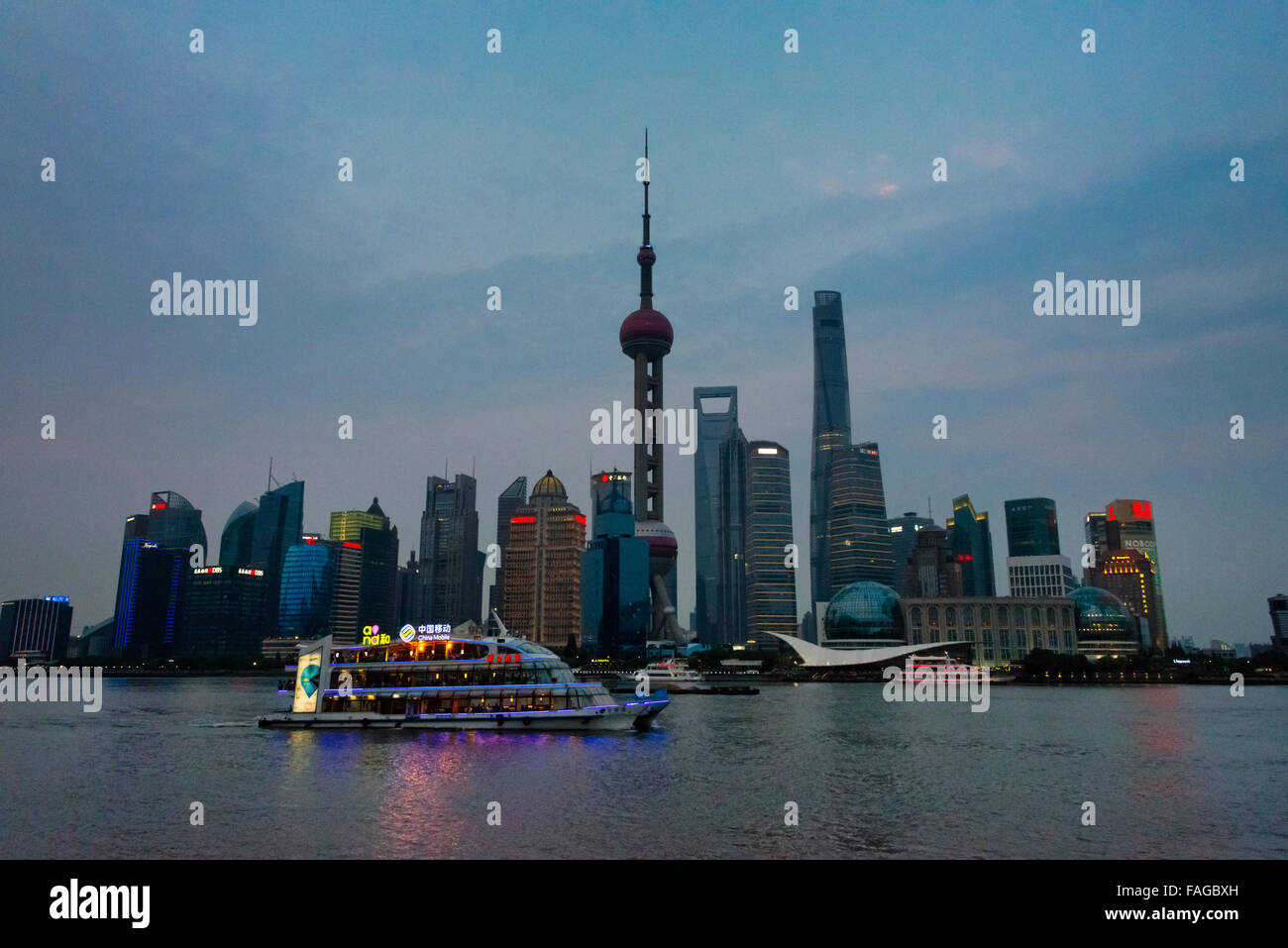 Pudong skyline by Huangpu River at dusk, Shanghai, China Stock Photo ...
