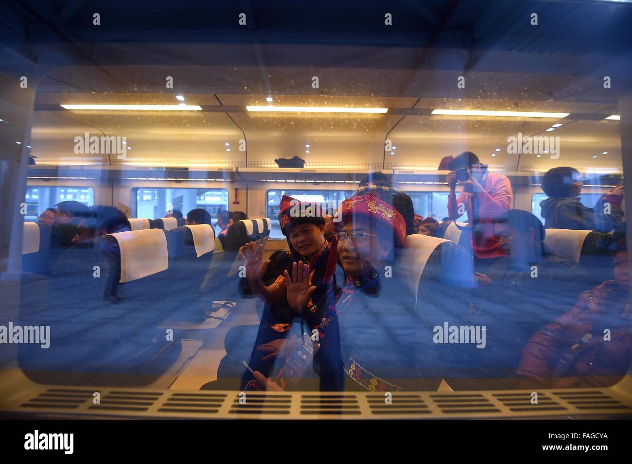 Haikou, China's Hainan Province. 30th Dec, 2015. Passengers in ...