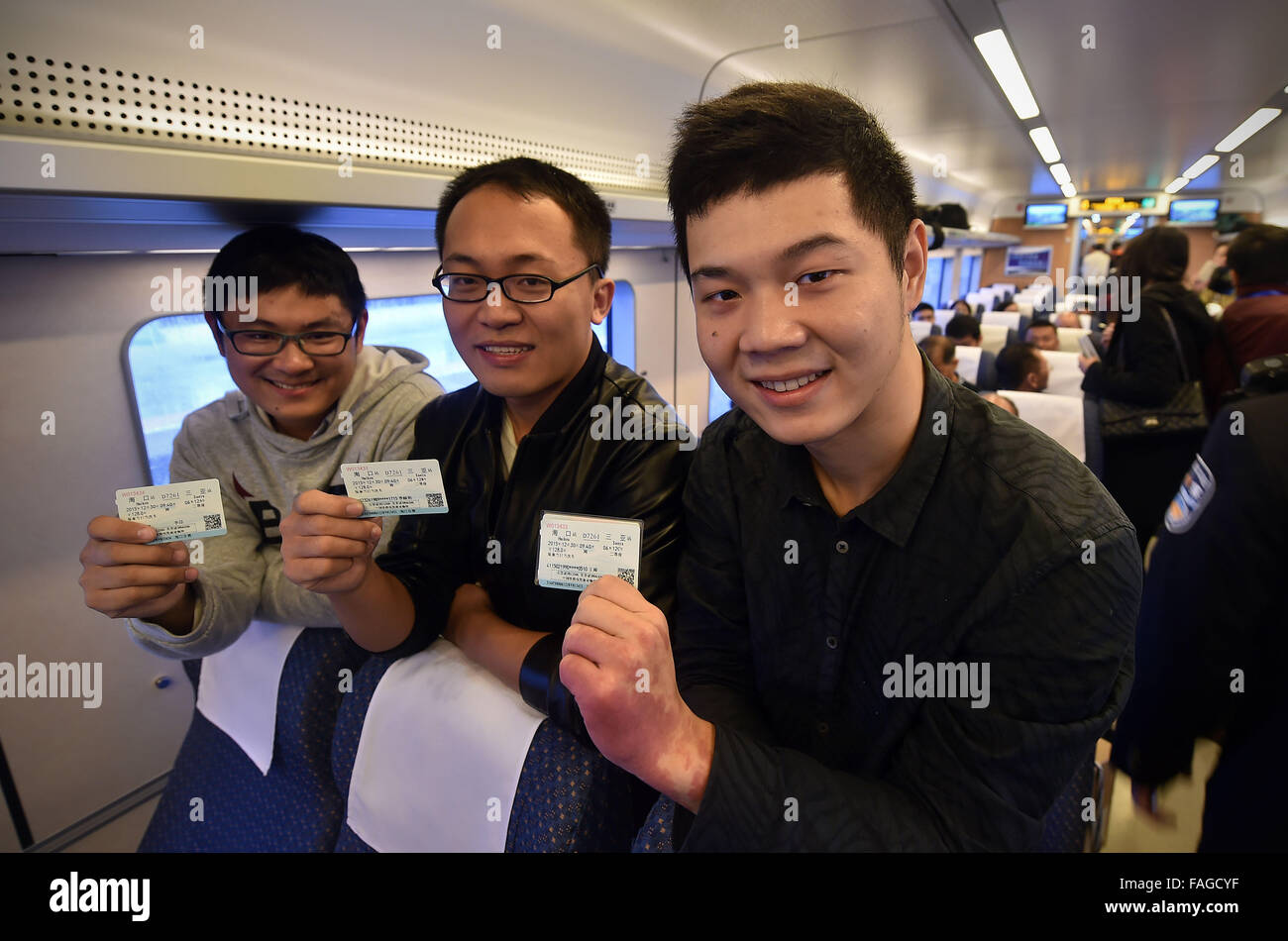 Haikou, China's Hainan Province. 30th Dec, 2015. College students show ...