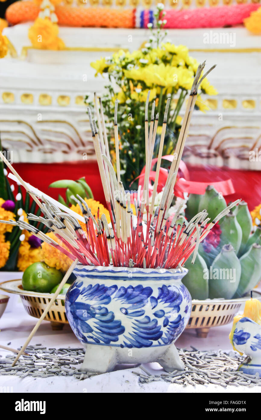 Gold pot joss stick hi-res stock photography and images - Alamy