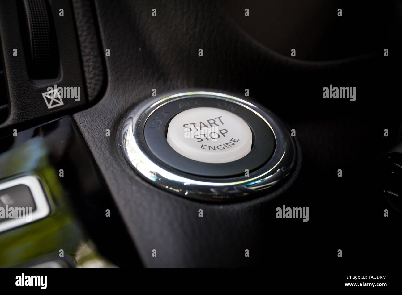 Detail on the start button in a car Stock Photo - Alamy