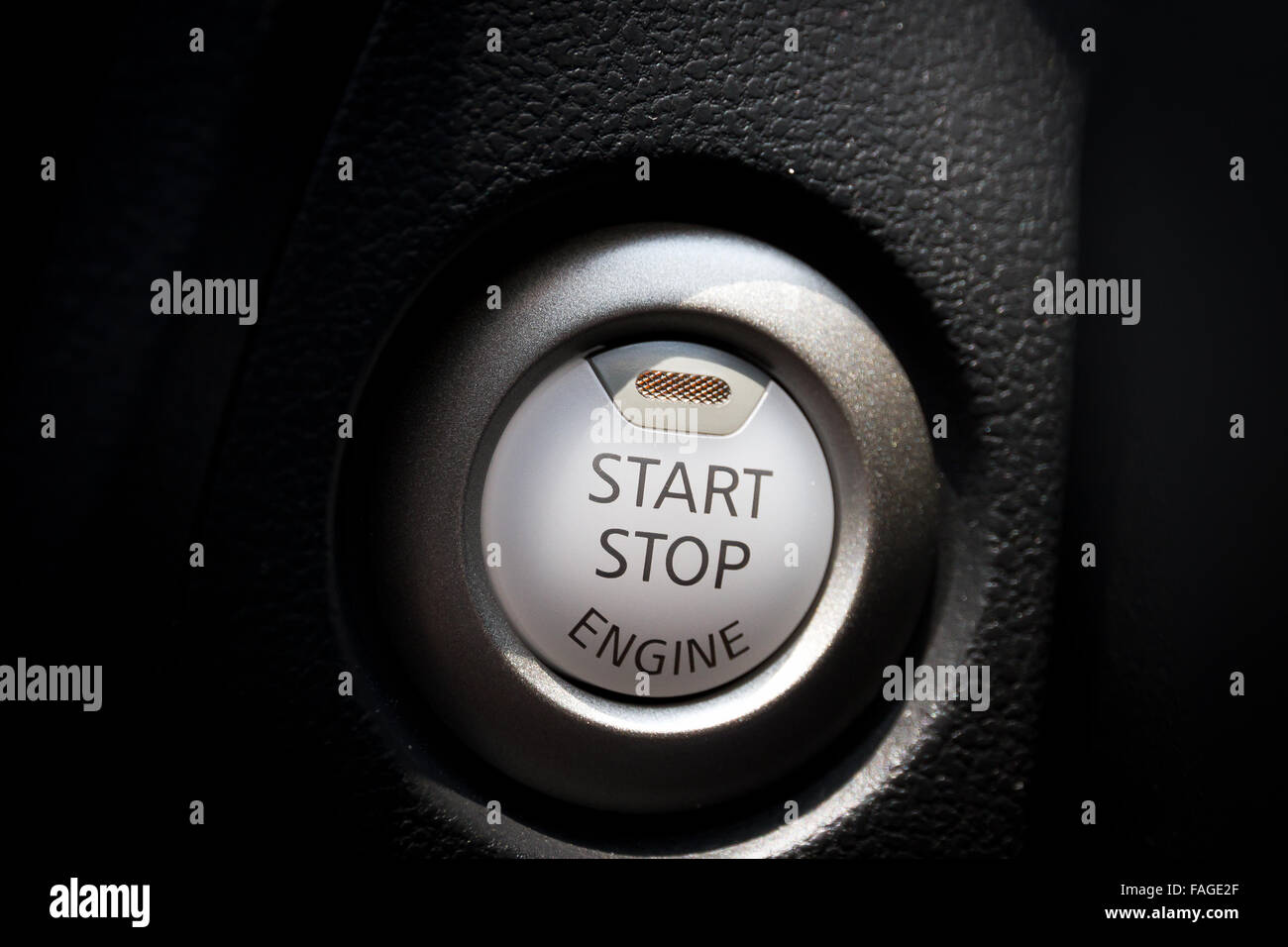 Detail on the start button in a car Stock Photo - Alamy