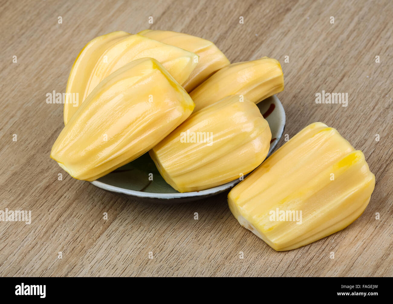 Tropical Jack Fruit on the wood background Stock Photo - Alamy