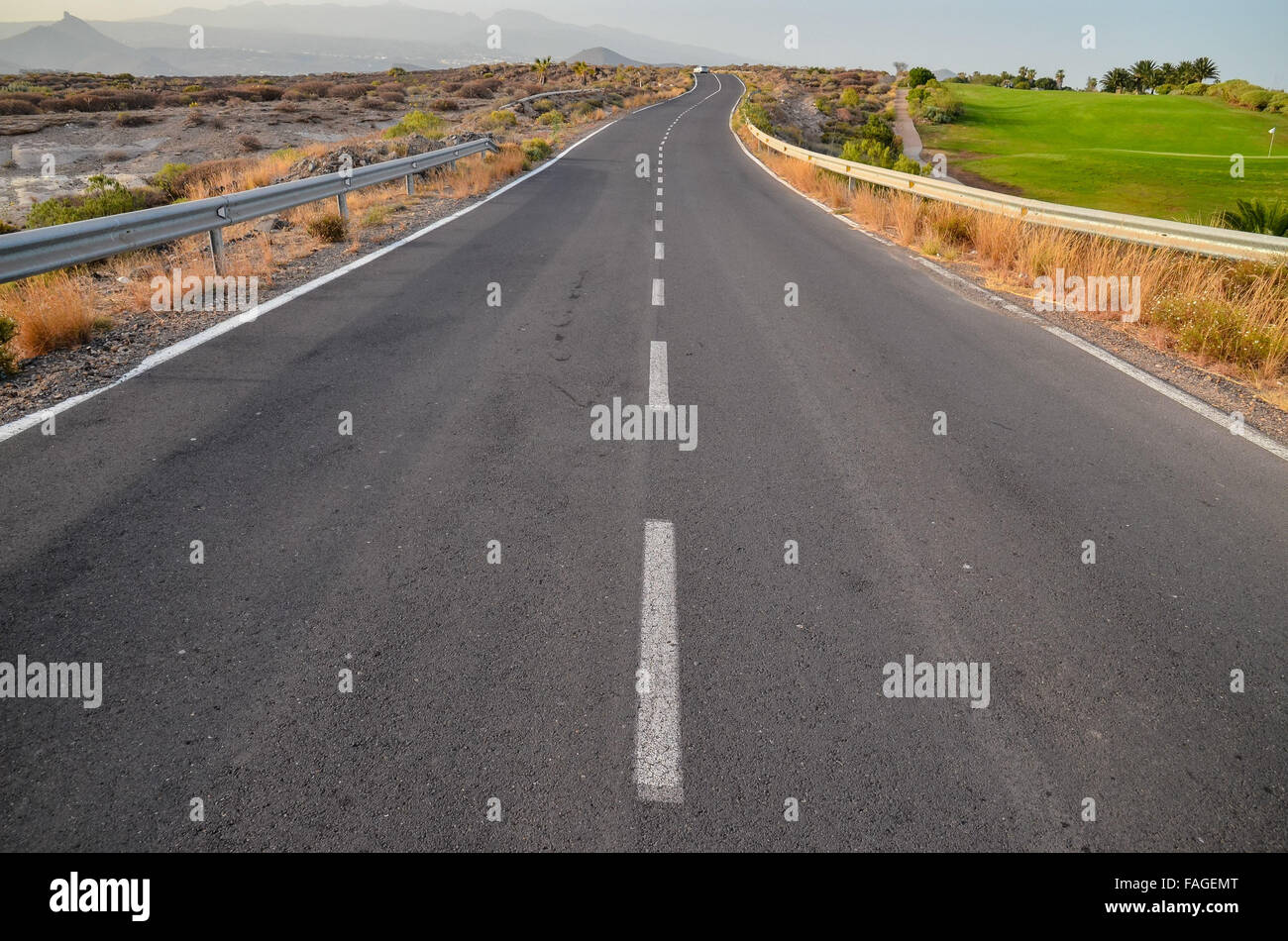 Long Lonely Road Stock Photo - Alamy