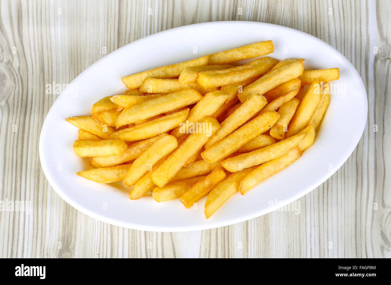 Hot fresh French fries snack in the plate Stock Photo - Alamy